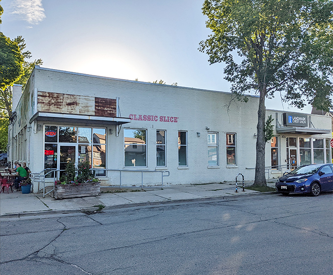 Clean lines and simple promises - sometimes the best pizza comes from unpretentious places.