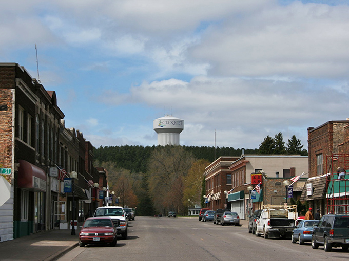 Cloquet's main street offers small-town charm where your dollar stretches further beneath that iconic water tower backdrop.