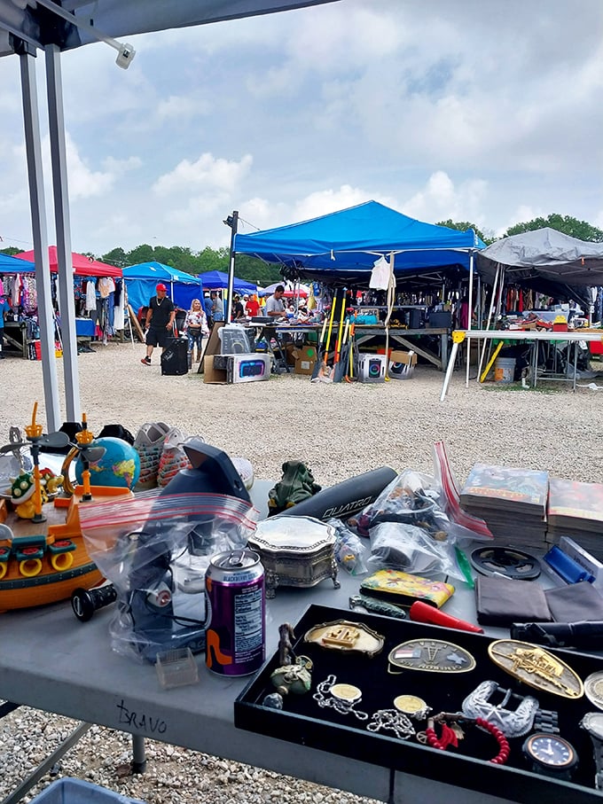 The long, wooden-beamed corridor stretches into the distance, lined with vendors selling everything imaginable. A shopper's yellow brick road!