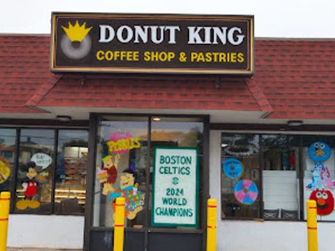Donut King's cheerful sign and cartoon-decorated windows promise a sugar rush that would make Willy Wonka jealous.