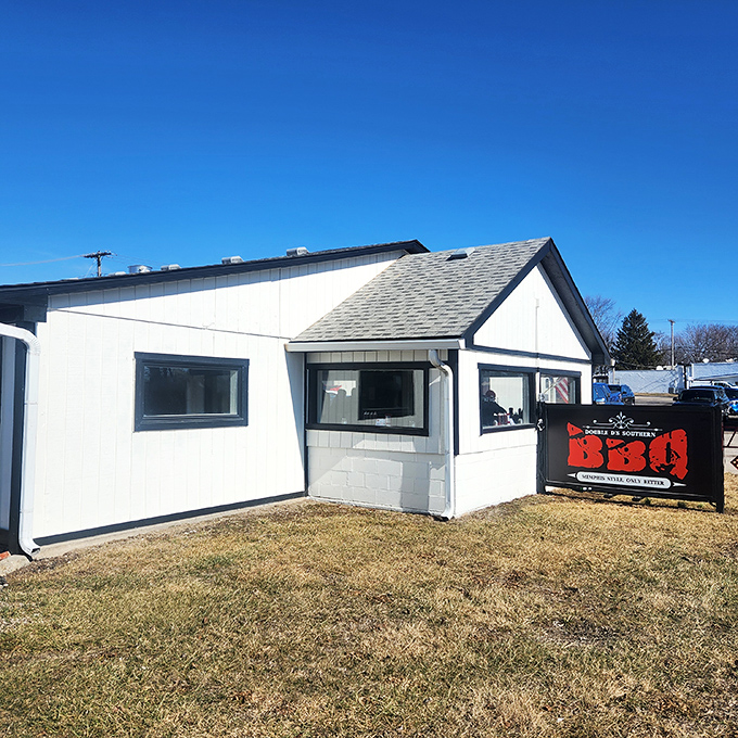Double D's crisp white exterior and bright red door are like a BBQ beacon on the horizon. Sunrise or sunset, that door leads to smoky happiness.