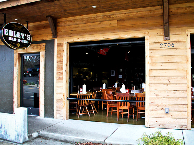 Edley's warm wooden facade feels like a barbecue hug – rustic charm with a side of Nashville cool.