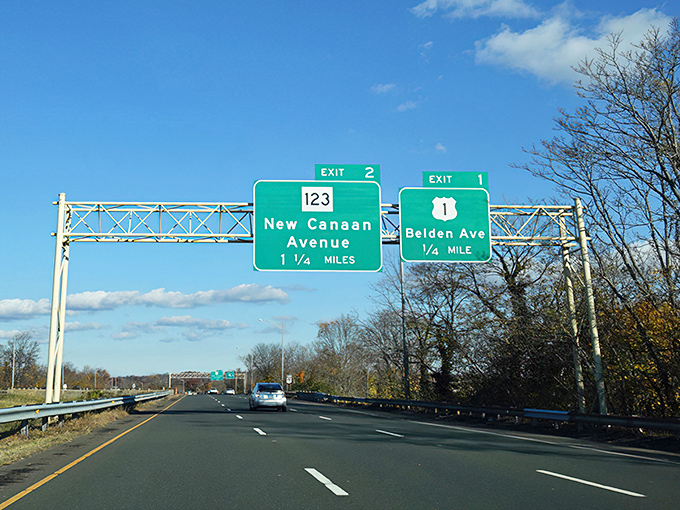 Highway signage never looked so hopeful! These blue-sky directions promise New Canaan adventures just 1&frac14; miles from your everyday routine.