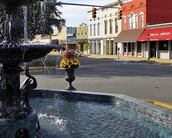 Splash into affordable living! Eufaula's historic downtown fountain reflects both architectural beauty and budget-friendly housing costs.
