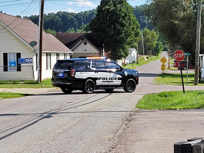 In Flatwoods, even the police cruisers look relaxed&mdash;patrolling streets where the biggest crime might be someone's lawn gnome going missing.