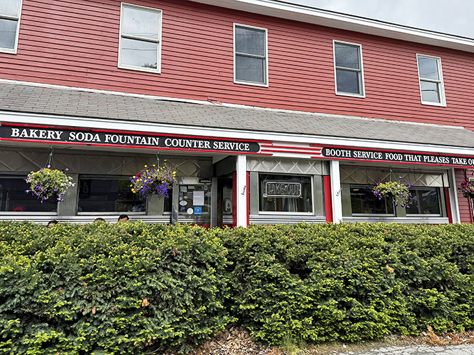 Four Aces Diner's weathered red siding and hanging flower baskets welcome you like an old friend who happens to make killer omelets.