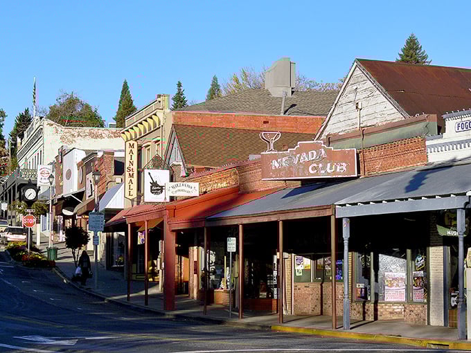 Nevada Club's vintage sign beckons retirees to a Grass Valley afternoon where golden sunlight, like your nest egg, stretches surprisingly far.