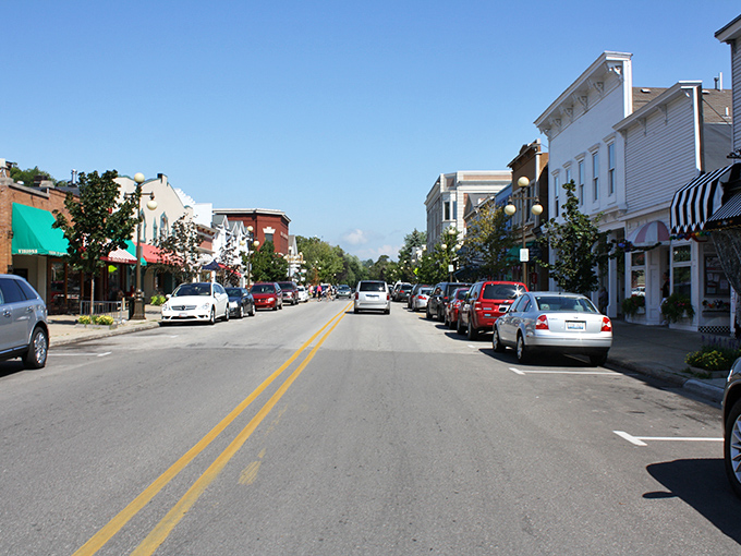 Stately storefronts in Harbor Springs stand like sentinels of simpler times, where shopping is still a social occasion.