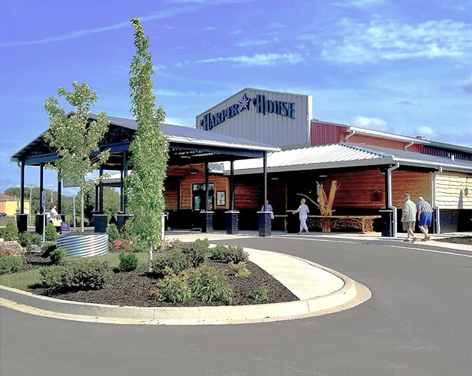 Rustic lakeside charm beckons hungry travelers with promises of hearty steaks and countryside hospitality.