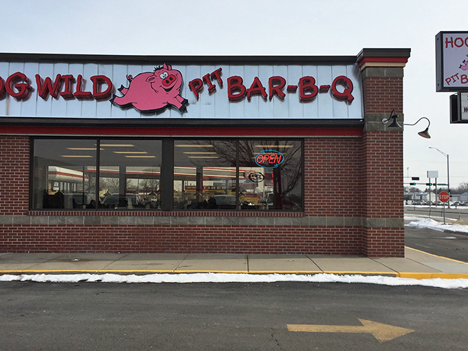 That cheerful pig mascot knows exactly what kind of delicious trouble awaits inside these doors.
