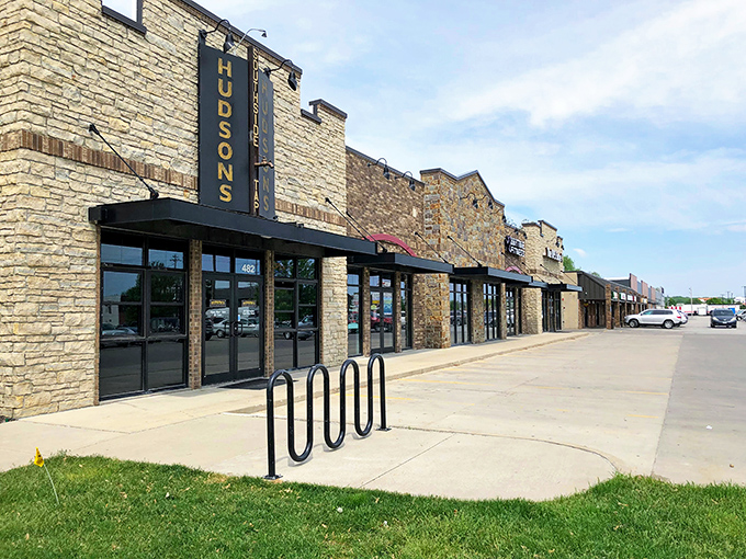 This stone fortress guards Iowa City's best-kept hot dog secrets behind those modern walls.