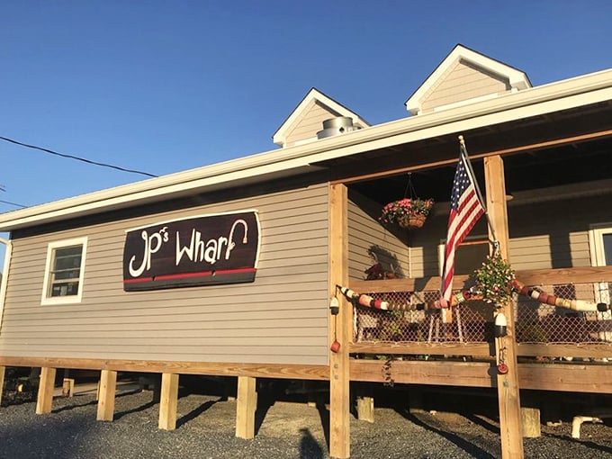 JP's rustic wooden sign and deck hint at the no-frills, all-flavor seafood experience waiting inside.