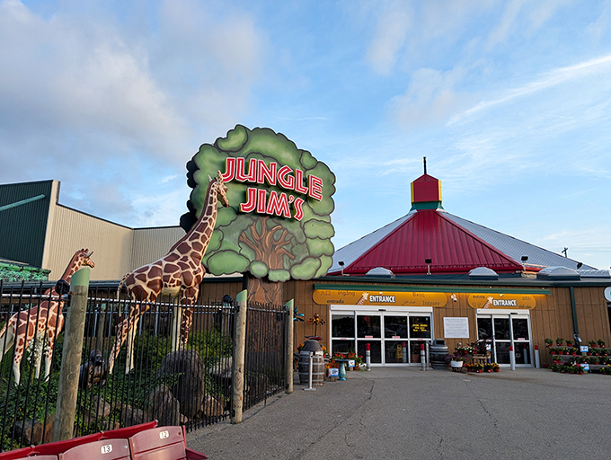 The entrance to Jungle Jim's International Market, where a life-sized giraffe statue welcomes shoppers to this grocery wonderland that's more theme park than supermarket.