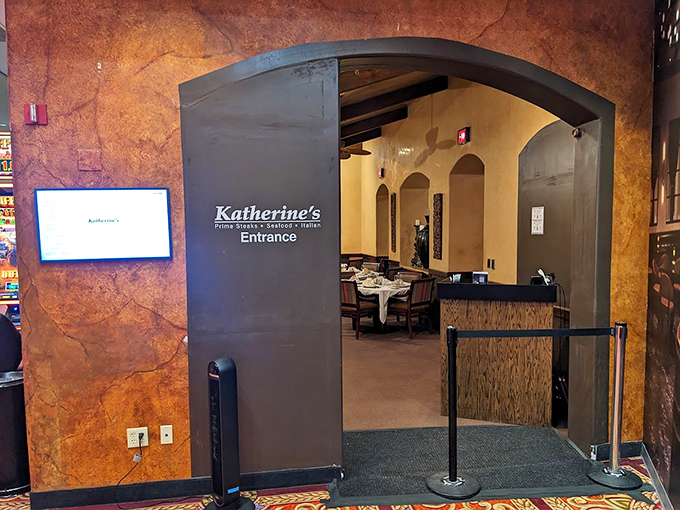 Katherine's entrance beckons like a portal to fine dining - elegant archways never go out of style.