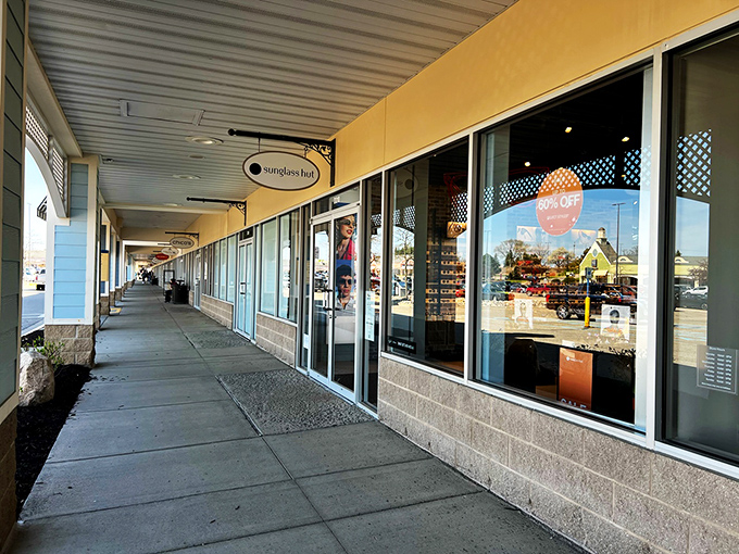 Those yellow and white buildings look like they sailed straight out of a Hamptons vacation catalog.
