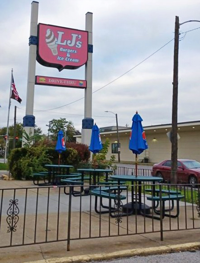 The classic red sign stands tall like a beacon for burger lovers everywhere. 