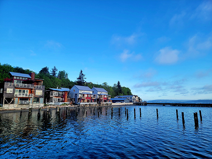Colorful waterfront cottages create their own little seaside paradise along this peaceful cove.