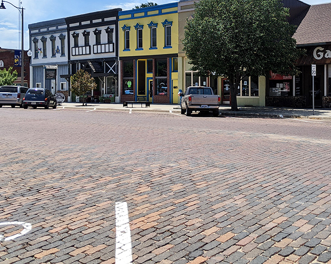 Lindsborg's colorful storefronts look like they were painted by someone who refused to believe buildings should be boring. Swedish influence never looked so good!