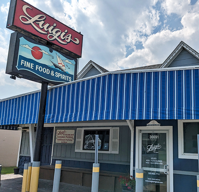 Luigi's nautical-themed sign beckons lake-goers and locals alike for a slice of pizza paradise.