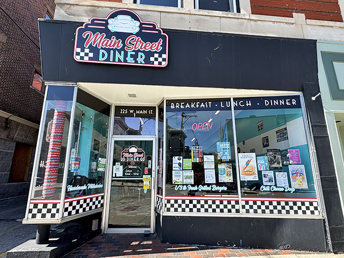 Black and white checkered patterns never lie - this is where real diner magic happens.