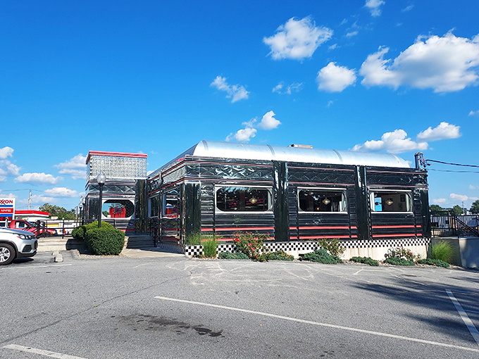 Silver streamlines and red accents create the perfect backdrop for serious comfort food conversations.