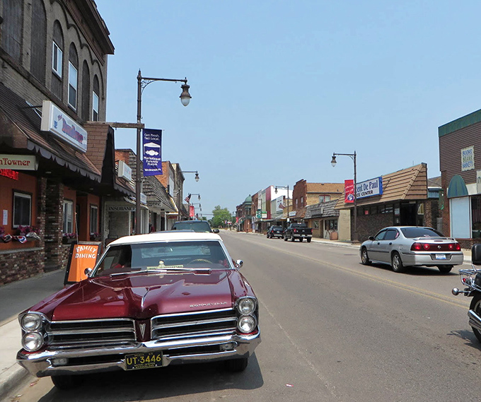That classic car parked on Manistique's main street costs more than some of the charming homes just a few blocks away.