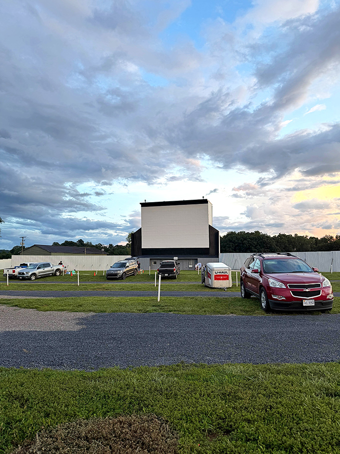 Moonlite Drive-In's screen awaits the darkness while a family-friendly bounce house promises pre-show entertainment for the little ones.