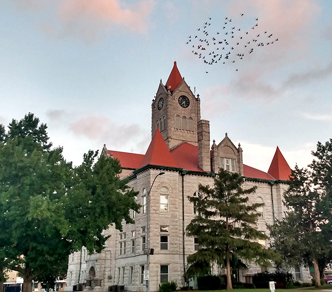 Majestic stonework! Nevada's historic courthouse stands proudly with its distinctive red roof and clock tower watching over the community.