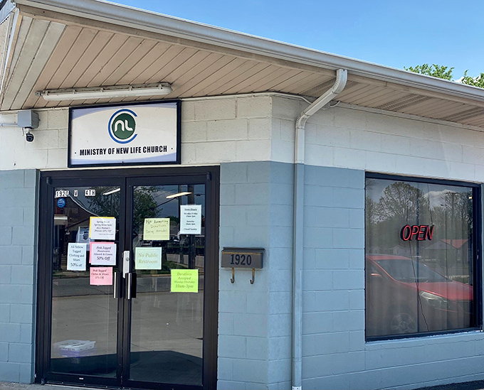 New Life Thrift's unassuming entrance belies its organized interior. Small building, huge savings!