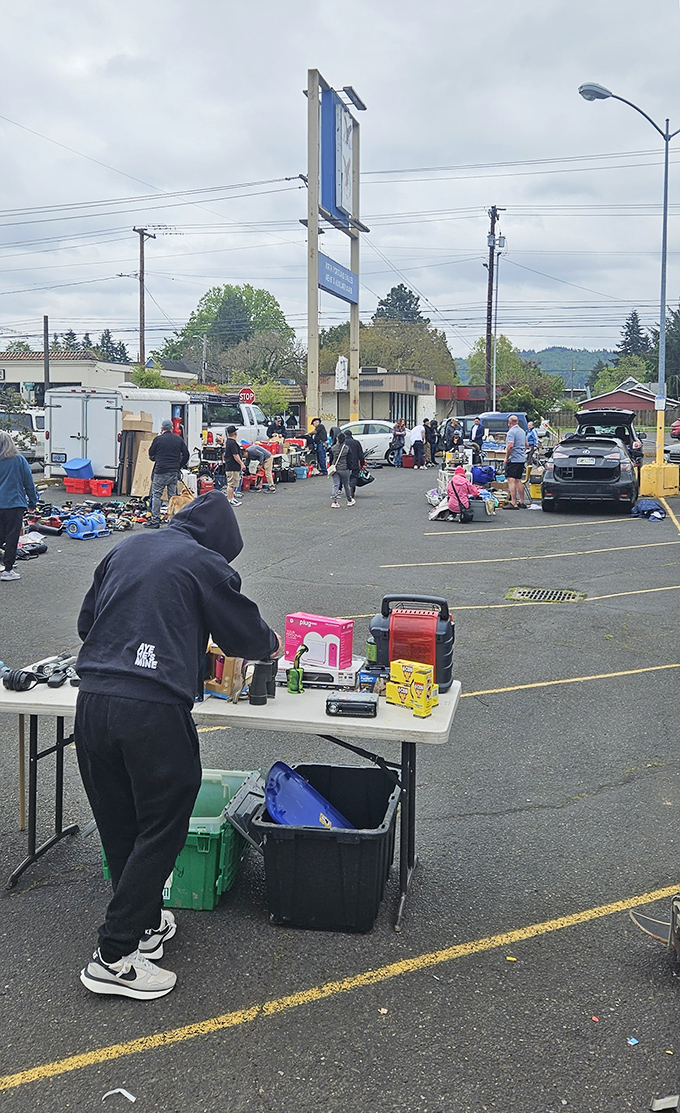 Parking lot sales bring out the best bargain hunters - democracy in action, one table at a time.