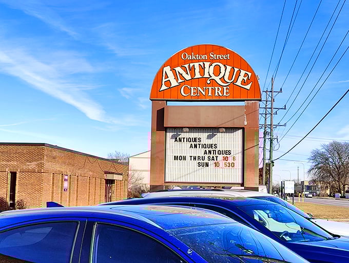 Oakton Street Antique Centre's unassuming sign promises a wonderland of vintage goodies behind that brick façade.