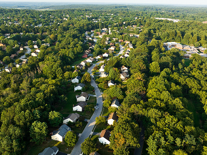 Owings Mills neighborhoods nestle among trees like a well-kept secret of suburban affordability near Baltimore.