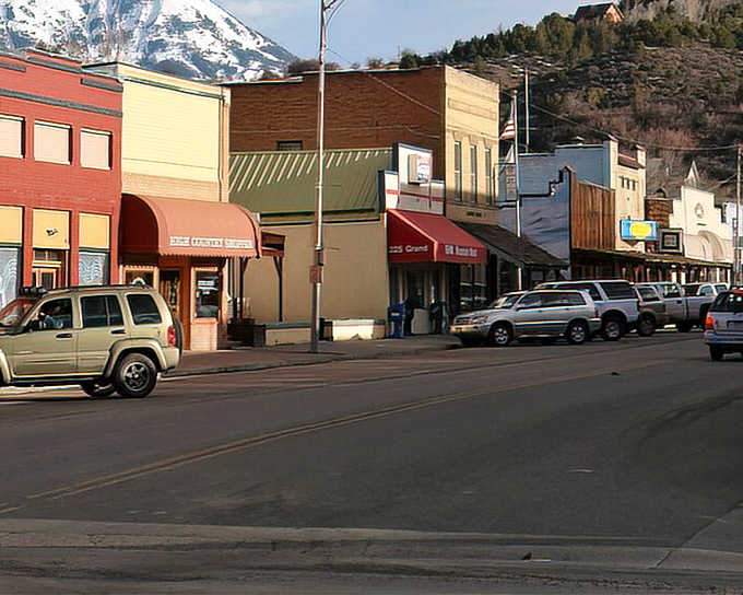 Paonia sits in the shadow of mountains that seem close enough to touch. Those storefronts have weathered decades of Colorado sunshine.