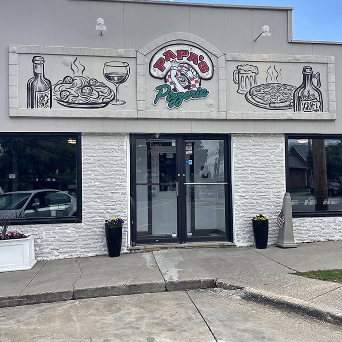 Papa's Pizzeria's cheerful storefront promises Italian comfort. That illustrated sign tells you they take pizza seriously &ndash; but not themselves.