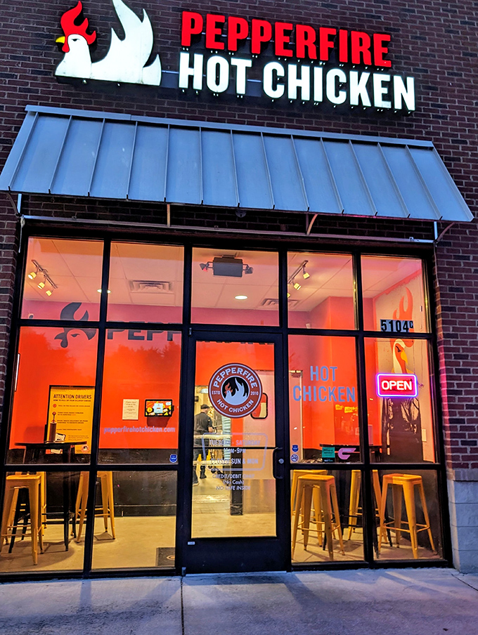 Pepperfire's fiery logo and bright orange walls are fair warning: this chicken means business!