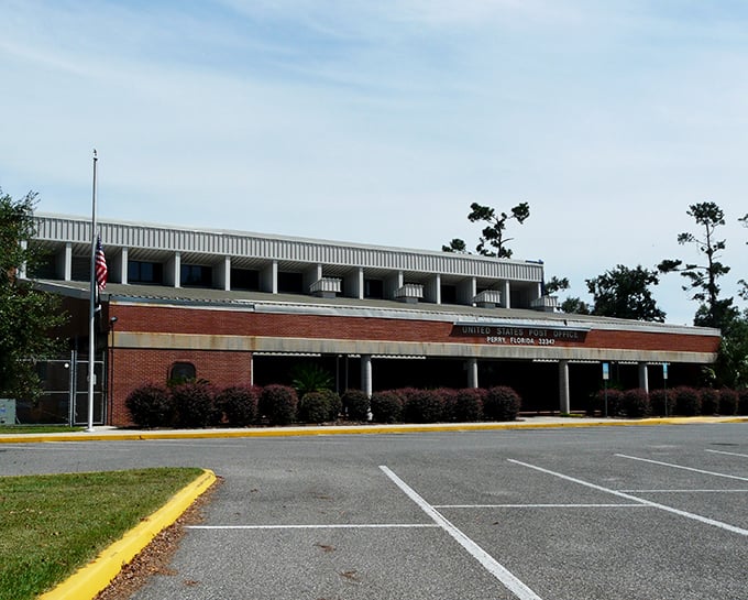 This classic brick building in Perry houses local businesses that have served the community for decades. Affordability with character!