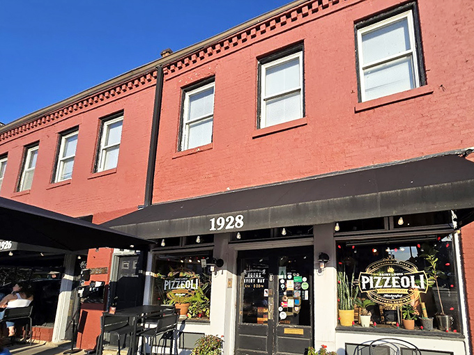 Red brick meets wood-fired dreams at Pizzeoli, where old-school charm creates new-school flavors.