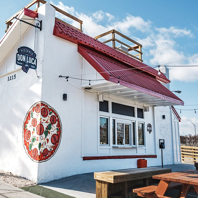 That giant pizza mural on Don Luca's white building isn't just art &ndash; it's a preview of coming attractions.