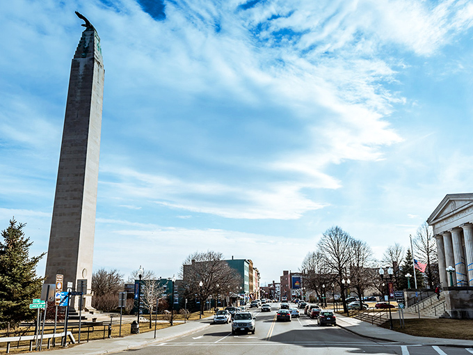 Plattsburgh's impressive monument stands tall against blue skies, a landmark in a city where your retirement dollars stand tall too.