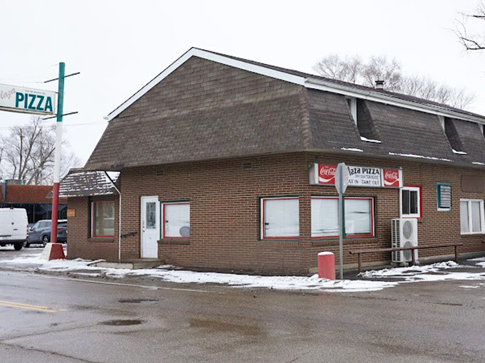 Plaza Pizza: This no-frills brick building might look like it's stuck in the 80s, but that's exactly why the pizza tastes so nostalgically perfect.