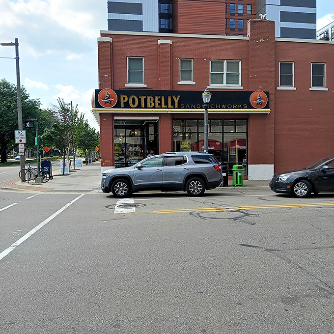 College town energy meets serious sandwich craftsmanship in this perfectly positioned East Lansing favorite.
