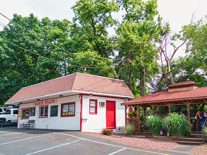 Small white building, big red personality - proof that great things come in tiny packages.