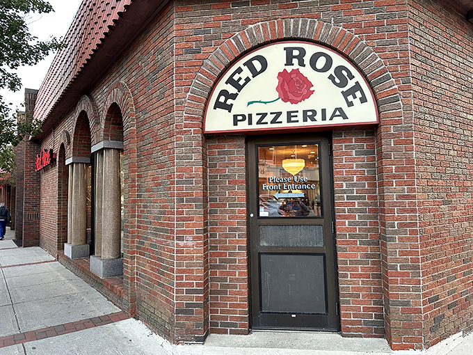 Red Rose Pizzeria's brick building and distinctive sign &ndash; Springfield's answer to "where should we eat tonight?"