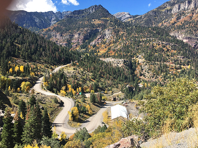 The view from Ridgway captures the essence of mountain living &ndash; dramatic peaks, winding roads, and autumn gold painting the landscape.