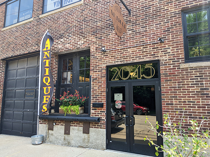 That hanging sign might as well say "Treasure Inside" for those who know that brick buildings in old neighborhoods hide the best finds.