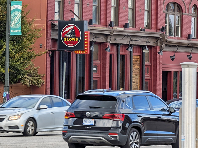 Slows' iconic sign stands proud against Detroit's historic brick backdrop &ndash; a modern classic in Michigan's BBQ landscape.