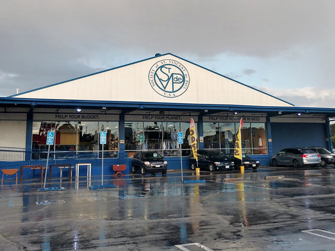 St. Vincent de Paul's massive blue and white building stands like a thrift store fortress. Their mission statement right on the facade reminds you shopping here helps others.