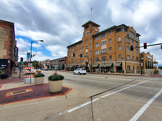 Rolling hills embrace this riverside gem like nature's own picture frame around perfection itself.