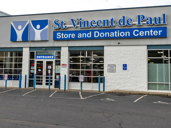 St. Vincent de Paul's clean, modern storefront invites both donations and discoveries. Blue signage, bigger bargains!
