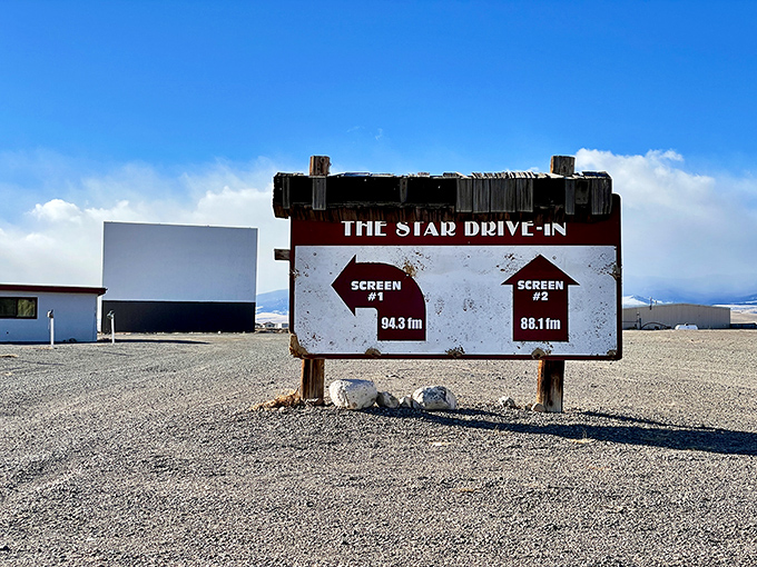 The Star Drive-In's weathered sign points the way to screens where generations of families have shared movie nights.